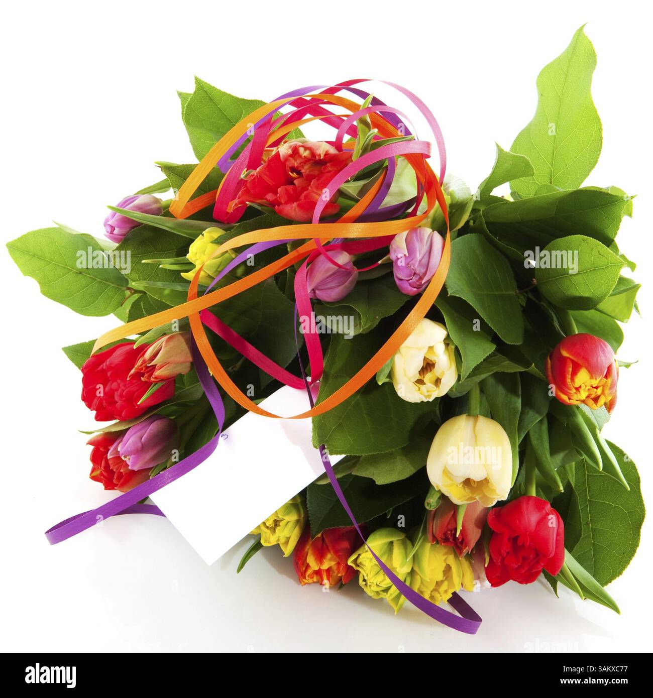 Flower gift with white card to write Stock Photo - Alamy