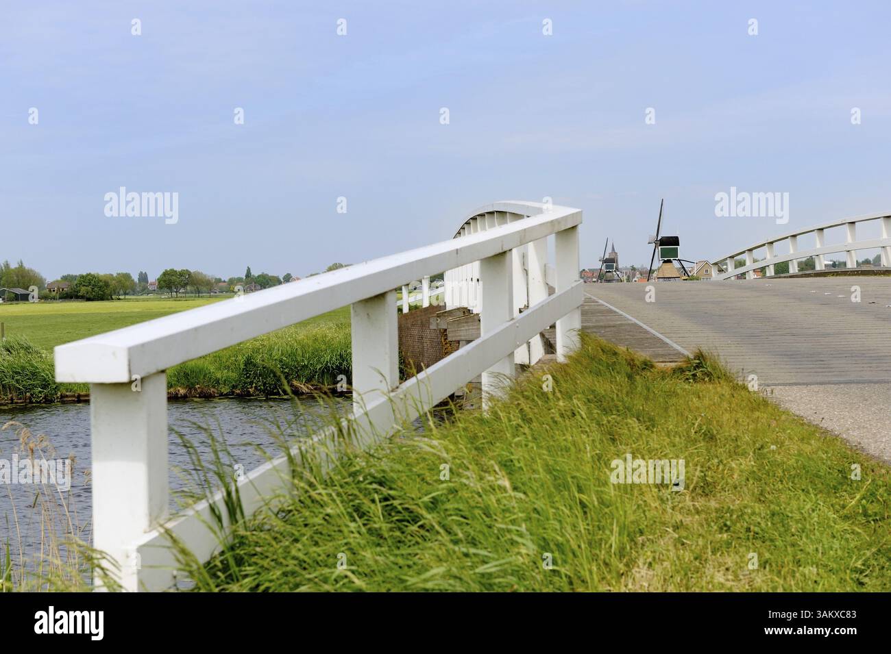 Typical Dutch landscape with windmills water and pastures Stock Photo ...