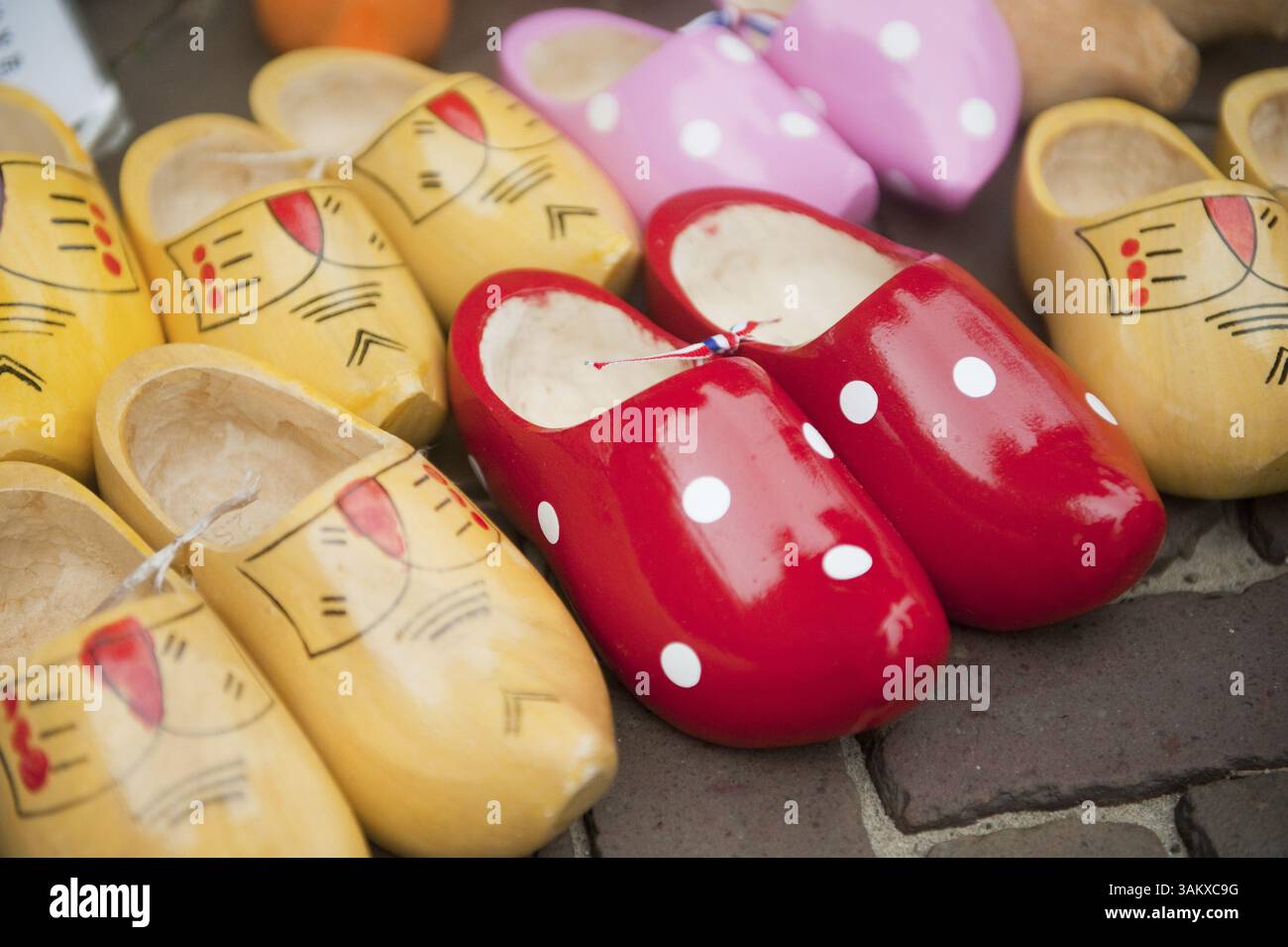Many Dutch wooden clogs at the market Stock Photo - Alamy