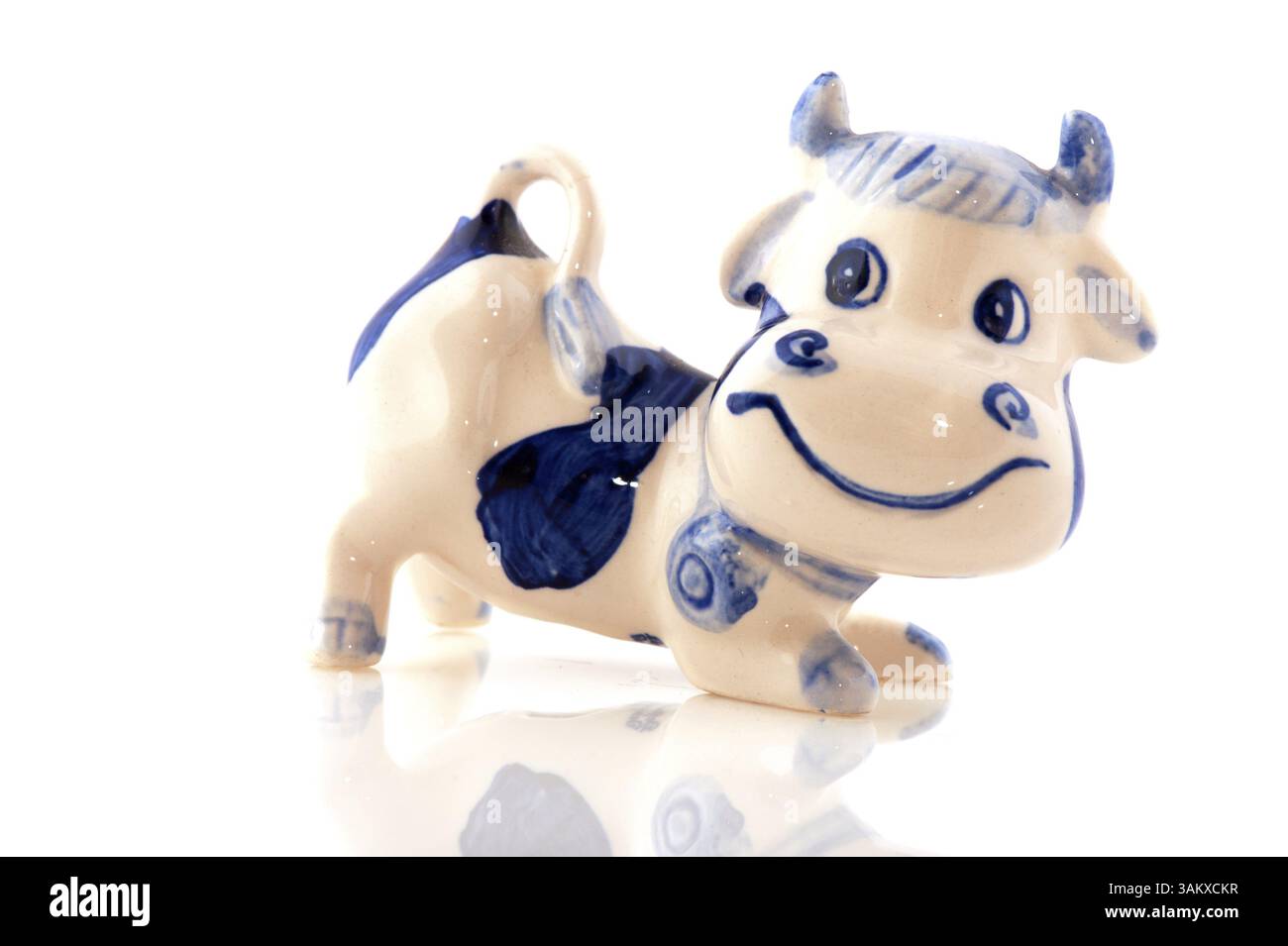 Dutch cow in Delfts blue isolated over white Stock Photo - Alamy
