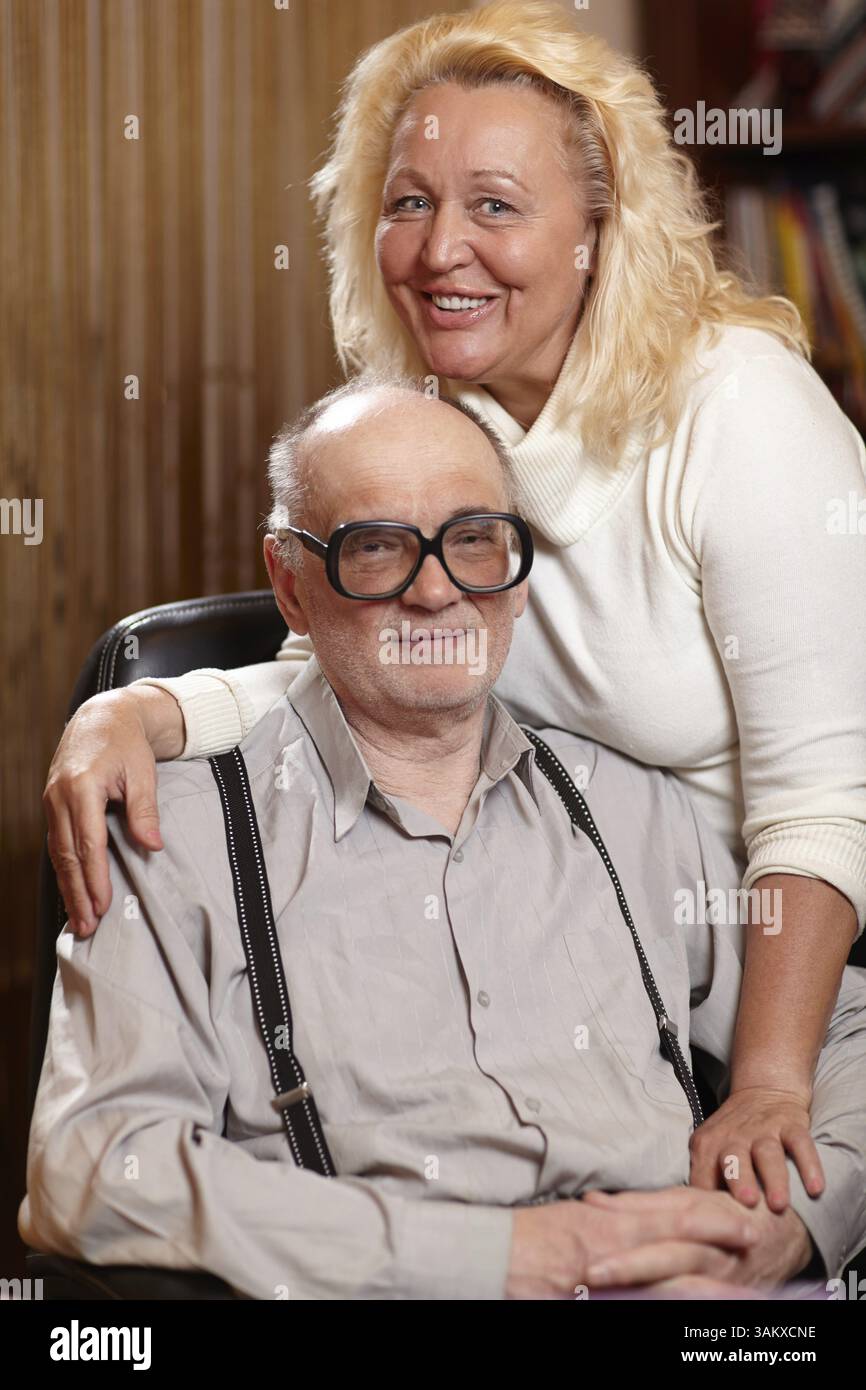 Happy seniors couple in love at home Stock Photo - Alamy