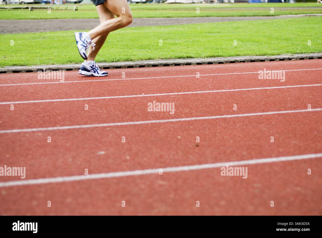 Running for the marathon on sports-ground Stock Photo - Alamy