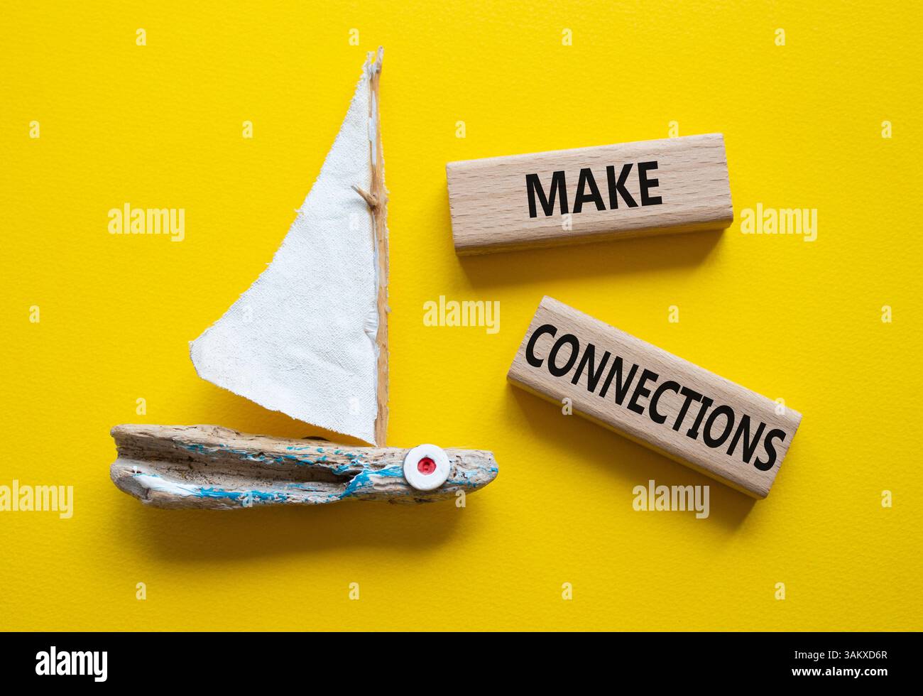 Make Connections symbol. Concept word Make Connections on wooden blocks ...