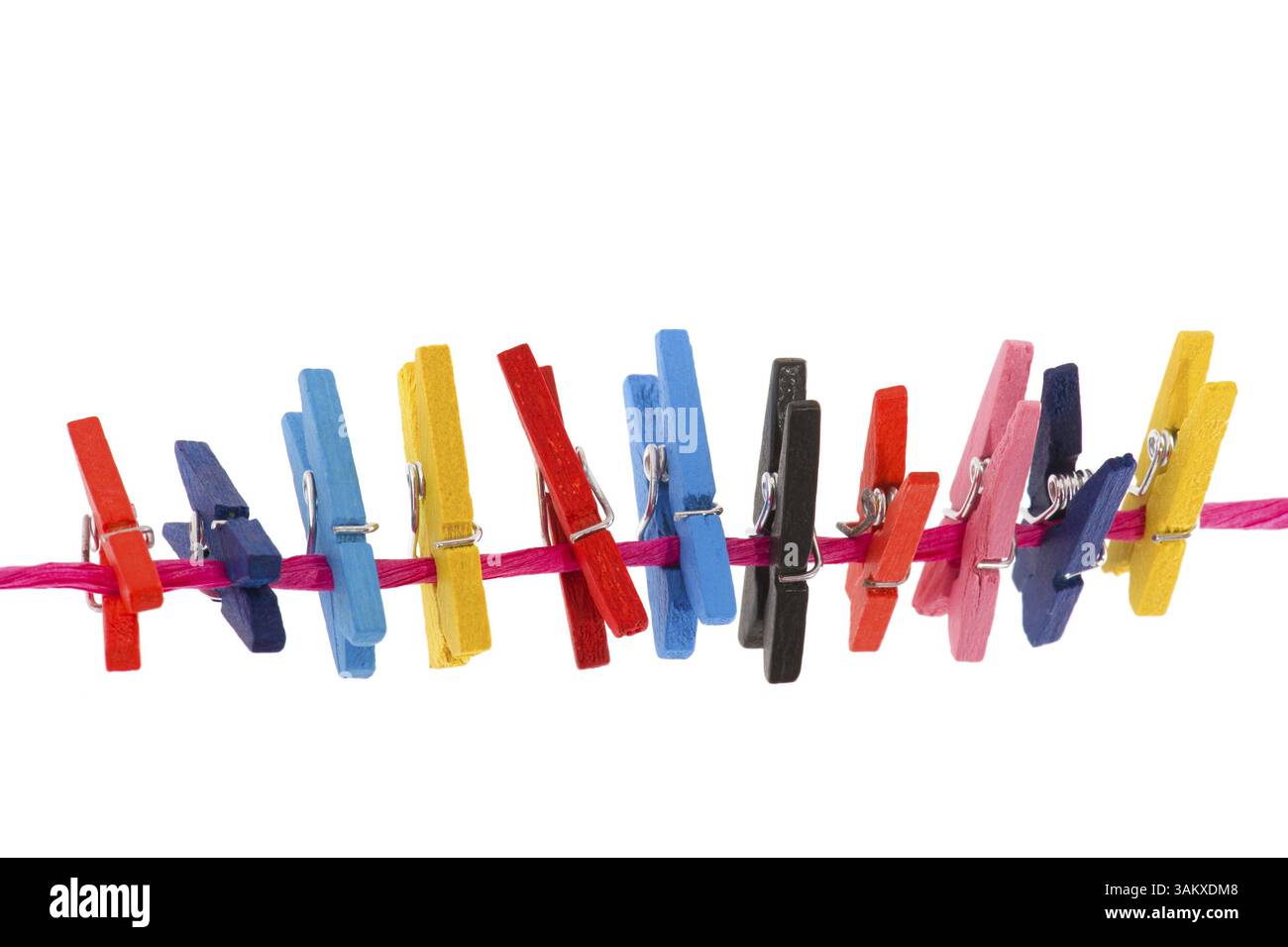 Colorful clothes pins for hanging the laundry Stock Photo - Alamy