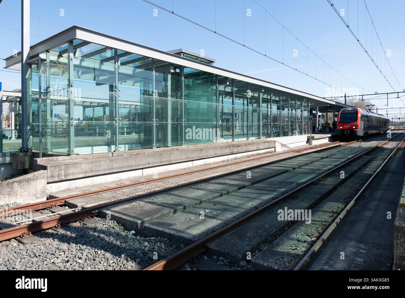 Red train from R-net, the public transport network of the Randstad ...
