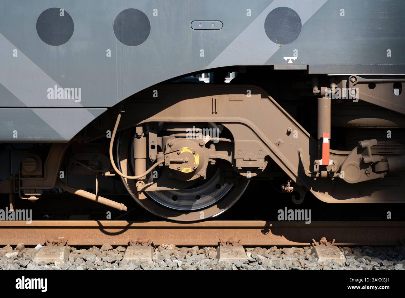 Wheel assembly and undercarriage of a train with wheels on the rail ...