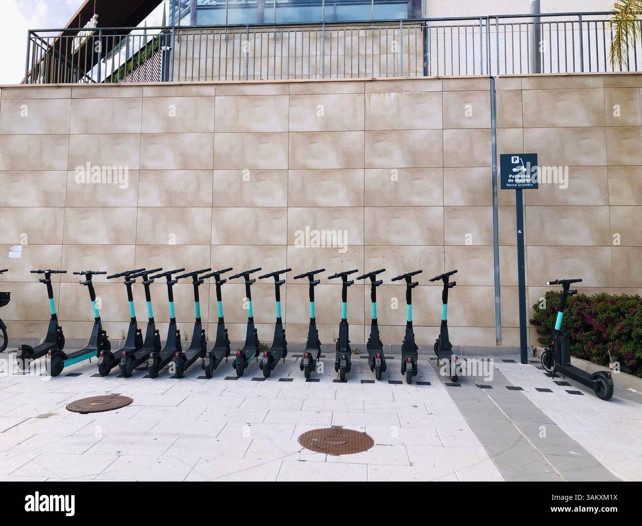 Alicante, Spain - April, 2025: Electric scooter parking at Zenia ...