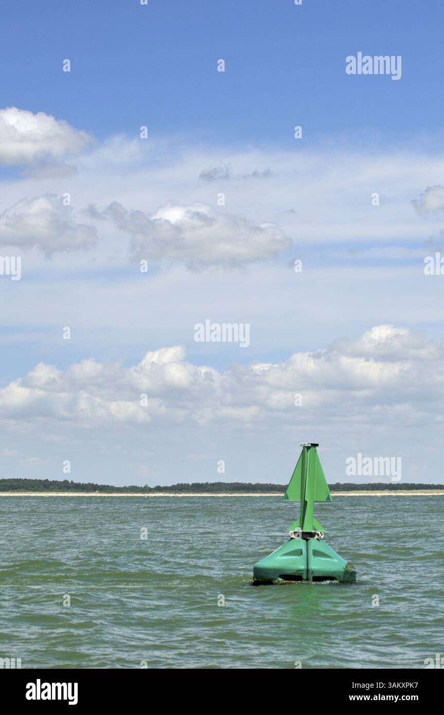 Landscape with beacon in the sea Stock Photo - Alamy