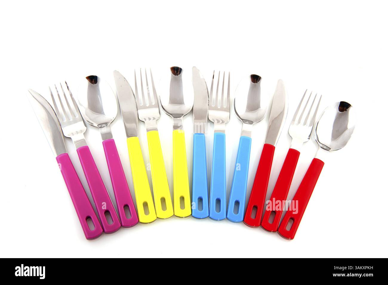 Colorful forks knifes and spoons with white background Stock Photo - Alamy
