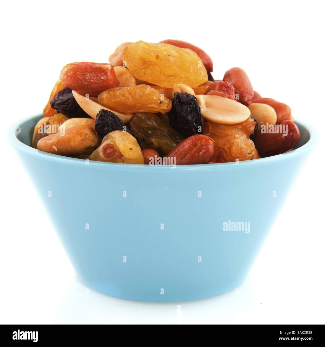 Mixed peanuts in a modern blue plastic bowl Stock Photo - Alamy