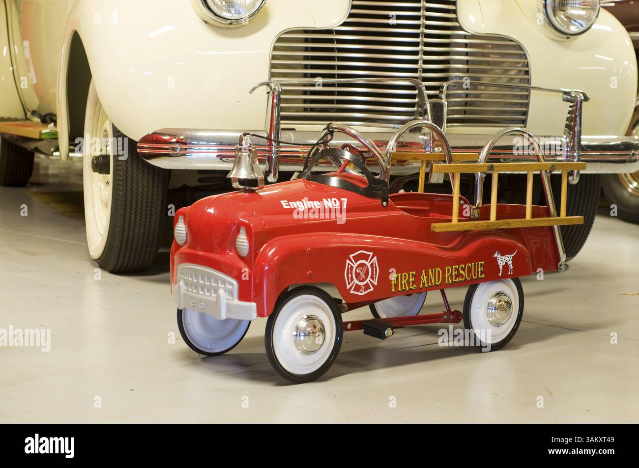 Miniature red fire brigade Stock Photo - Alamy