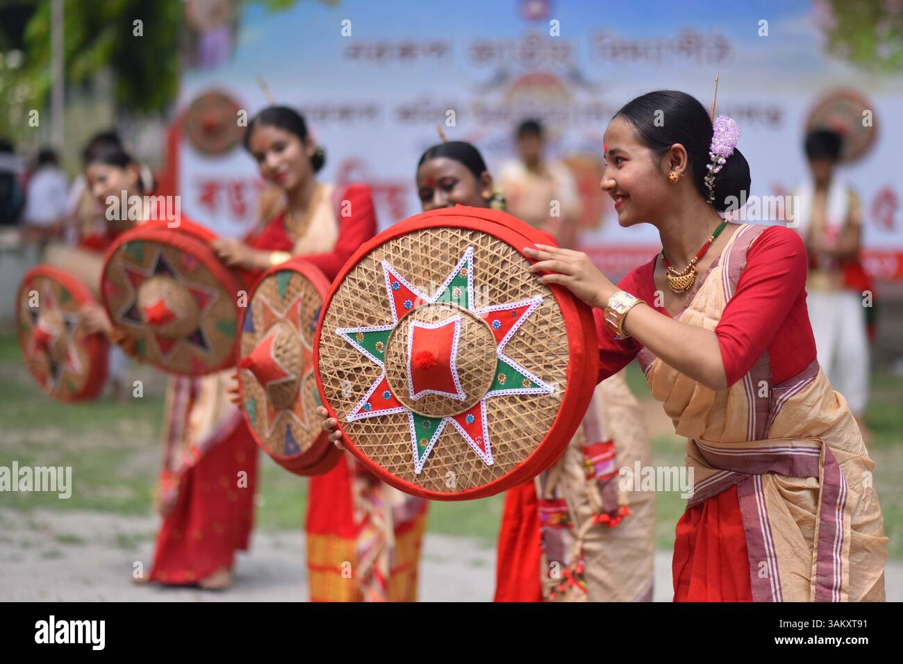 Assam. 12th Apr, 2025. Women in traditional dress perform folk dance ...