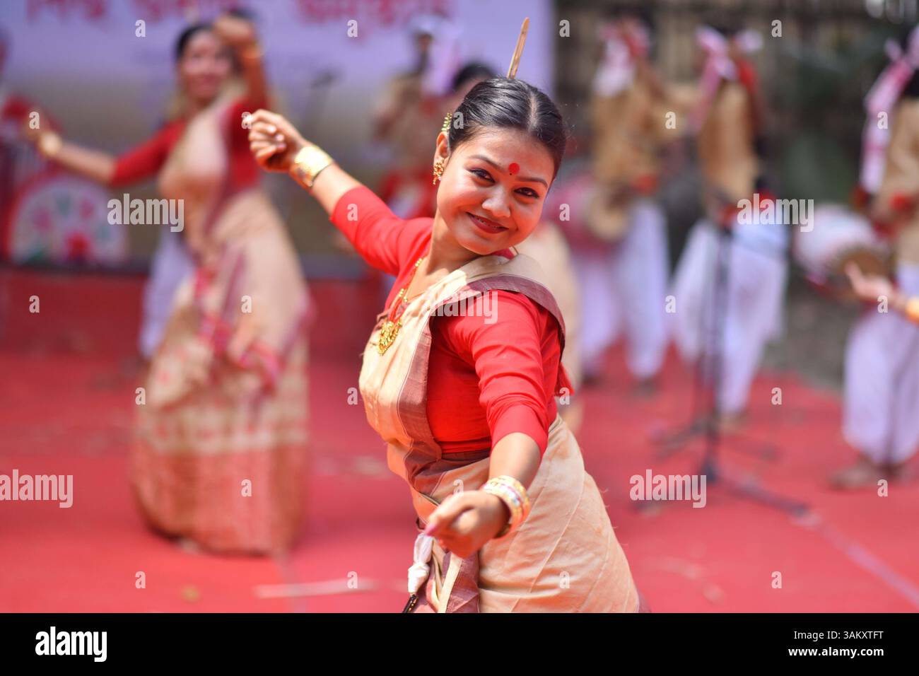 Assam. 12th Apr, 2025. Women in traditional dress perform folk dance during pre-celebrations of ...