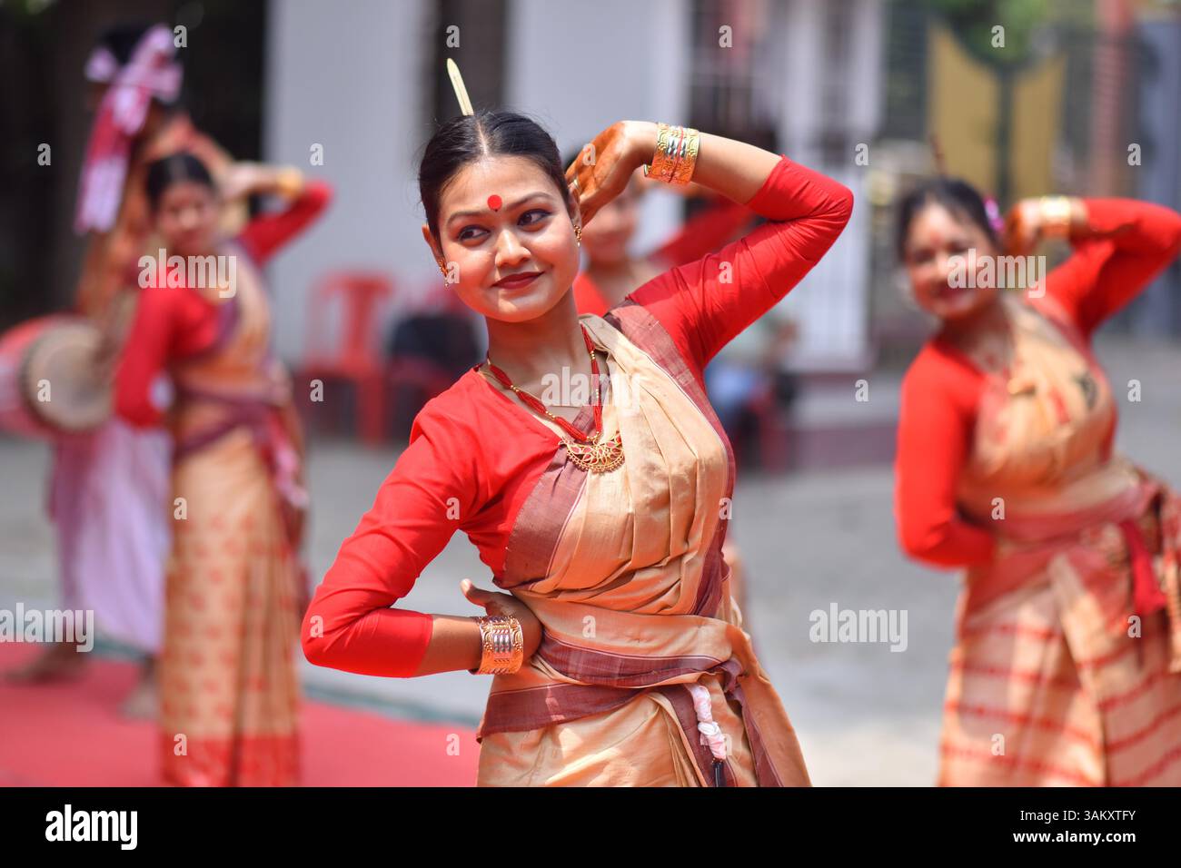 Assam. 12th Apr, 2025. Women in traditional dress perform folk dance ...