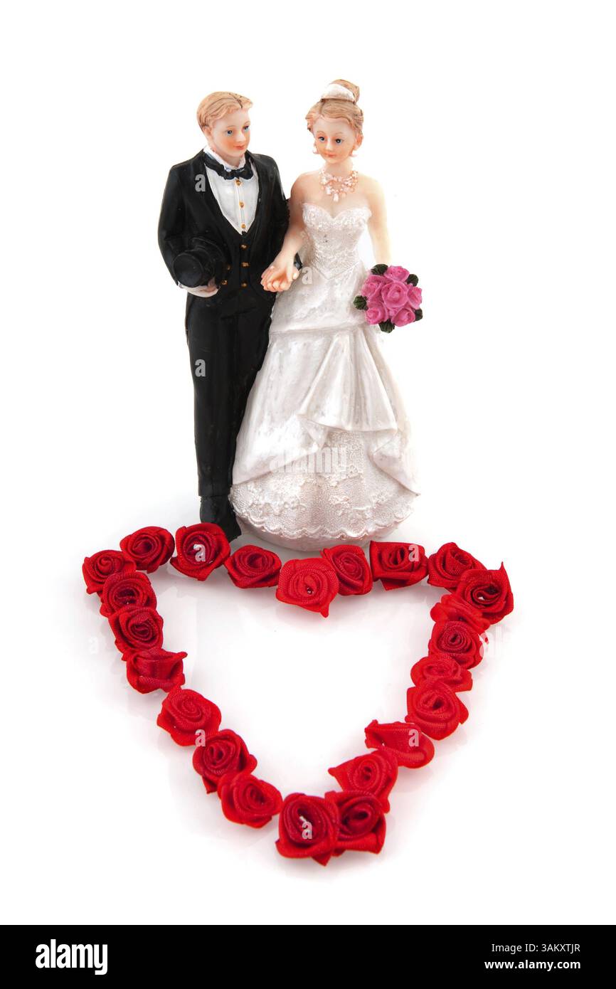 Marriage from a white couple with heart red roses Stock Photo - Alamy