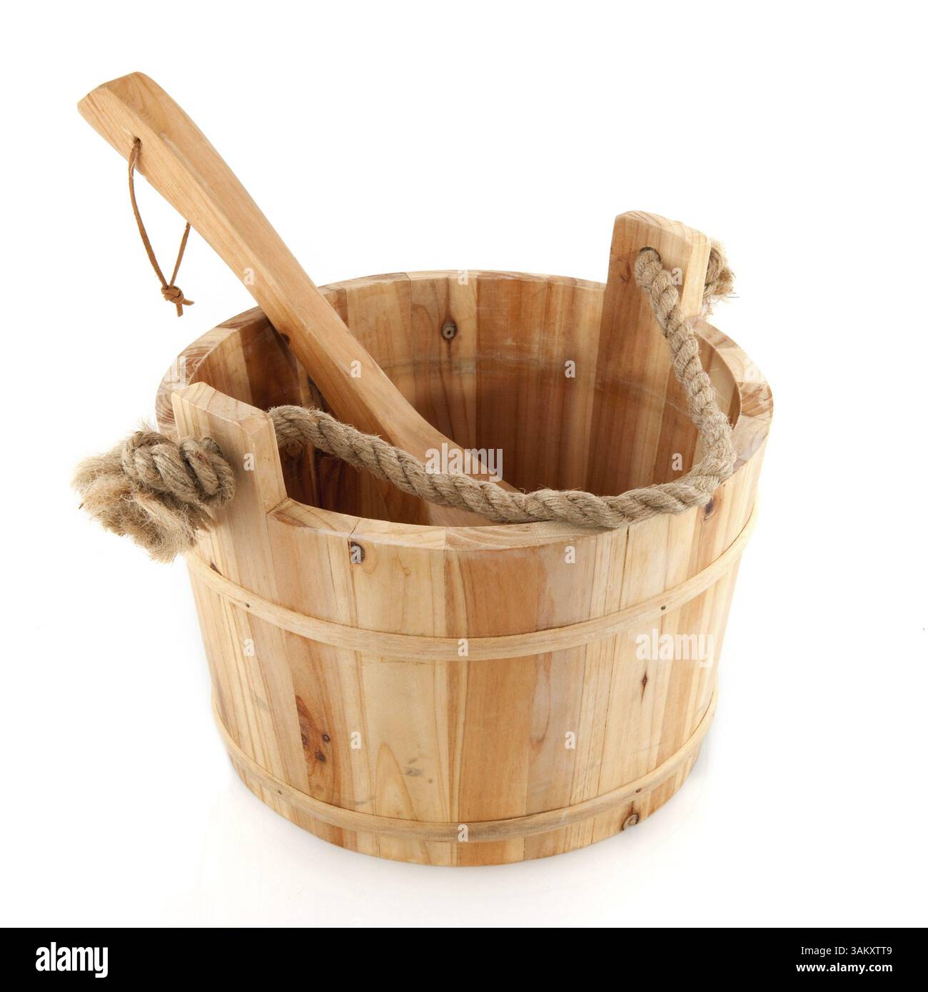 Wooden sauna bucket with spoon isolated over white Stock Photo - Alamy