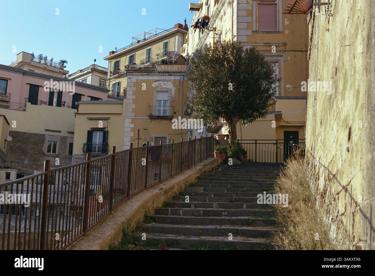 Naples view with old houses and ancient stone stairs leading up ...