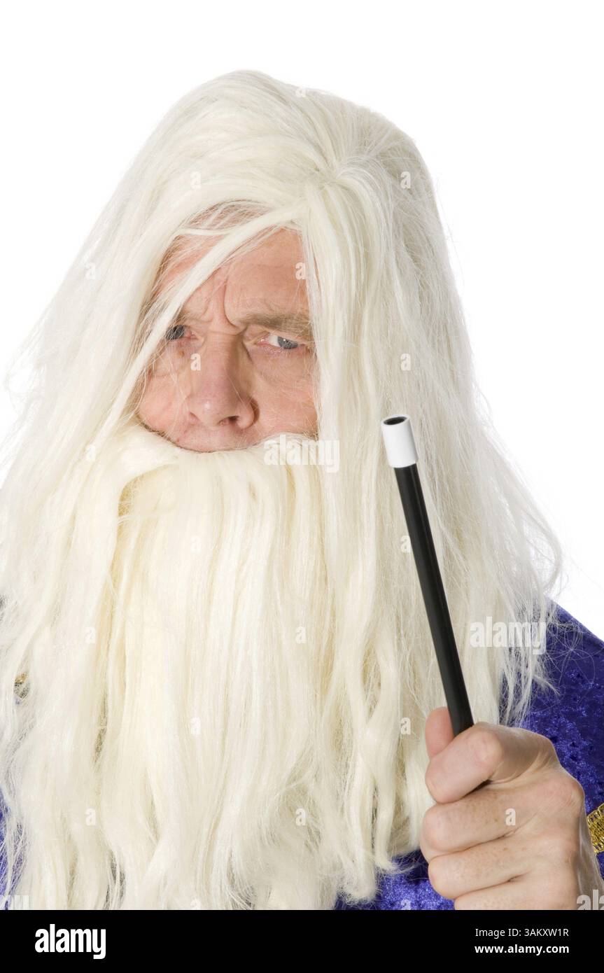 Wizard with magic stick Stock Photo - Alamy
