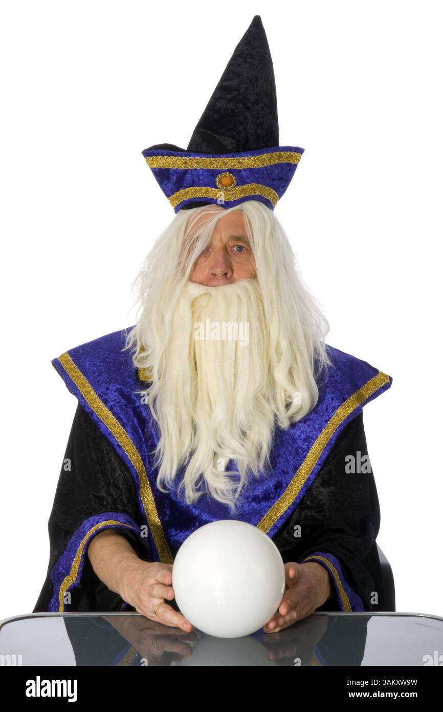 Wizard with the glass ball Stock Photo - Alamy