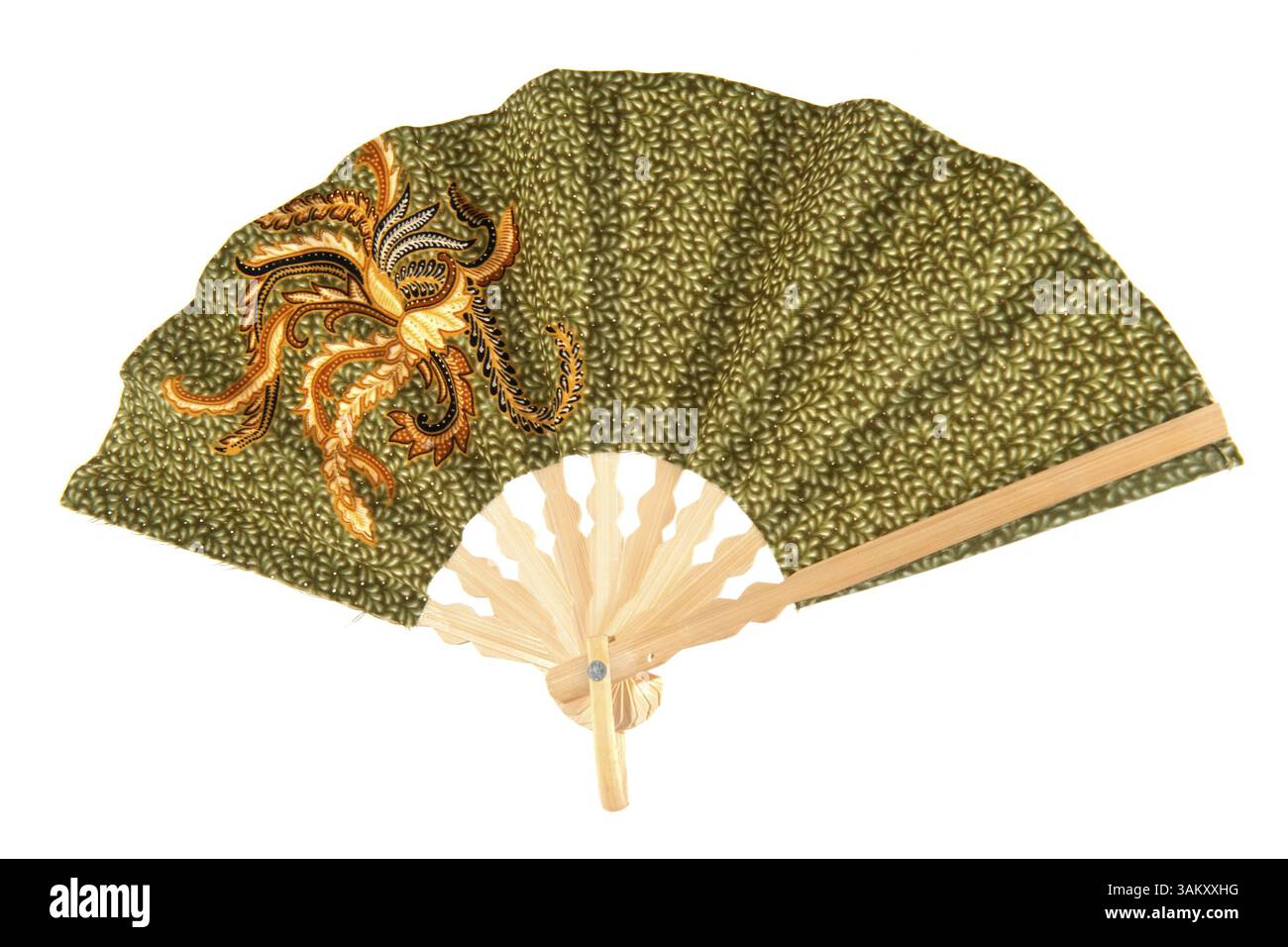 Batik handheld fan with traditional cloth isolated over white Stock ...
