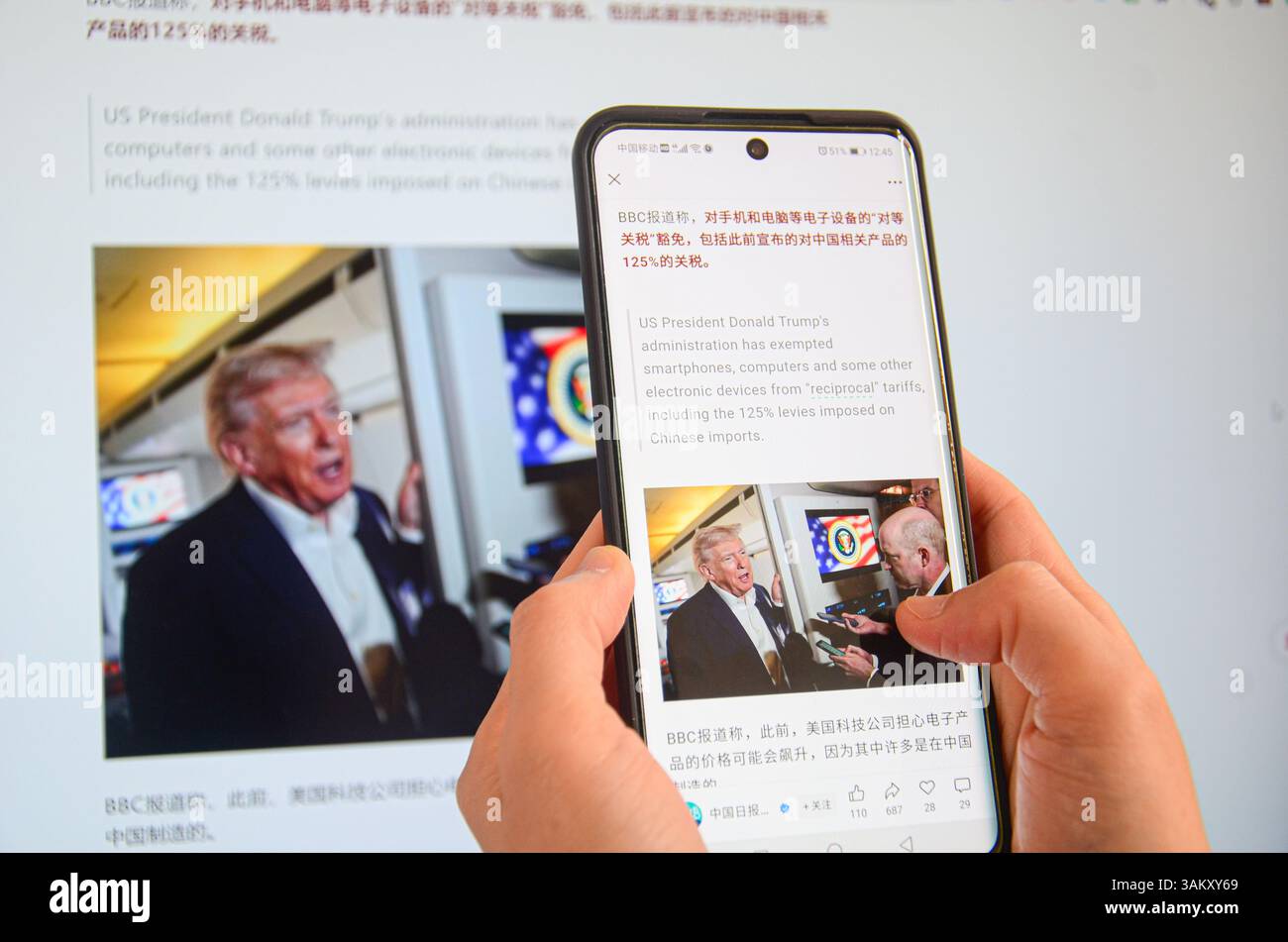 Jiangmen,Guangdong,China.13rd April,2025.Chinese people use smartphone ...