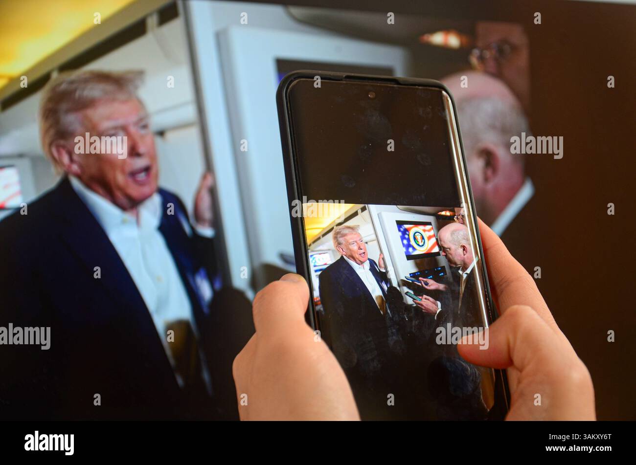 Jiangmen,Guangdong,China.13rd April,2025.Chinese people use smartphone ...