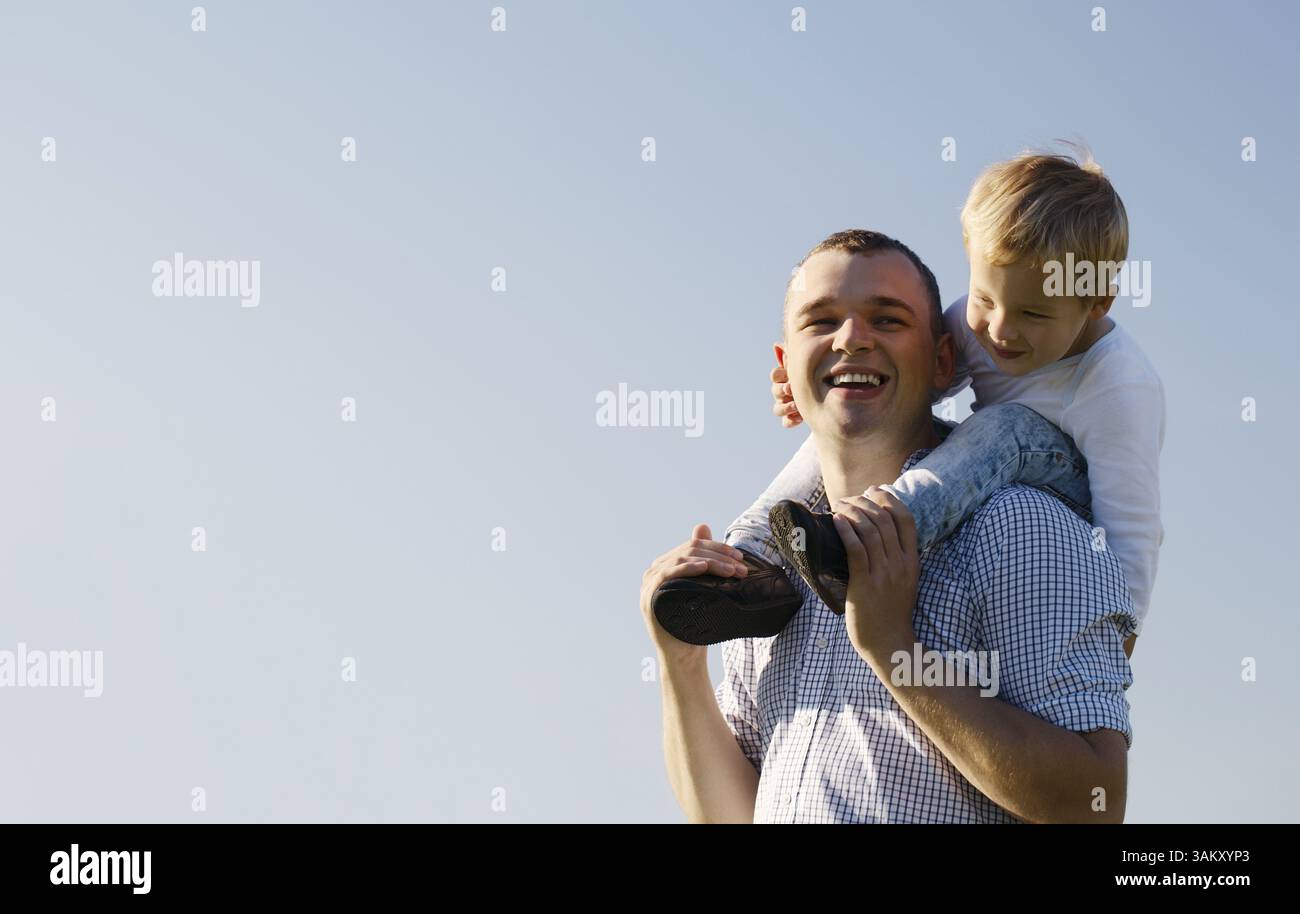 Piggyback ride on daddy young hi-res stock photography and images - Alamy