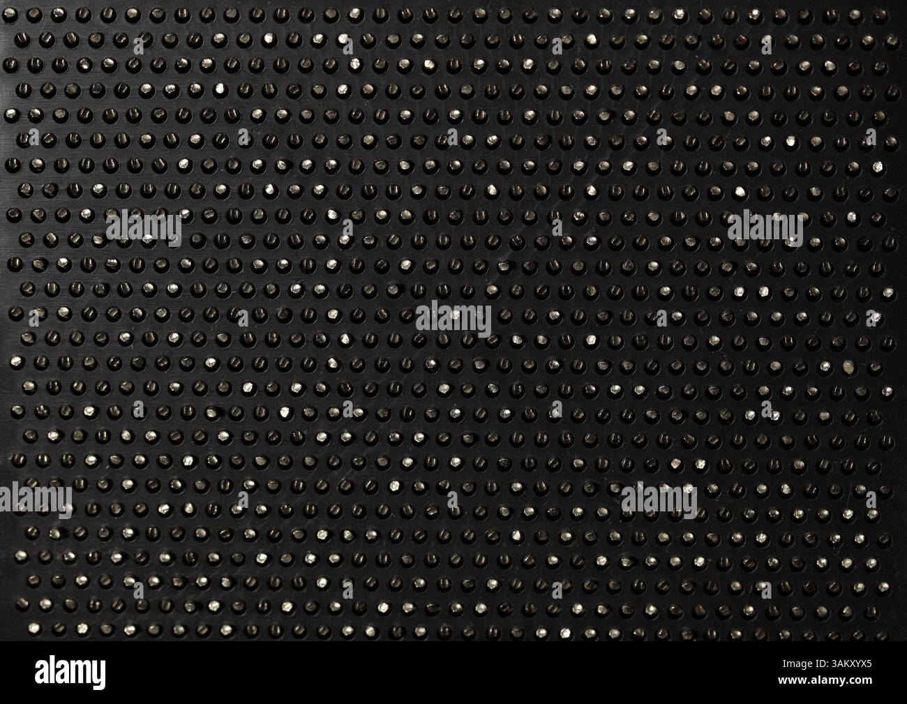 Abstract black metal texture pattern. Many metal dots Stock Photo - Alamy