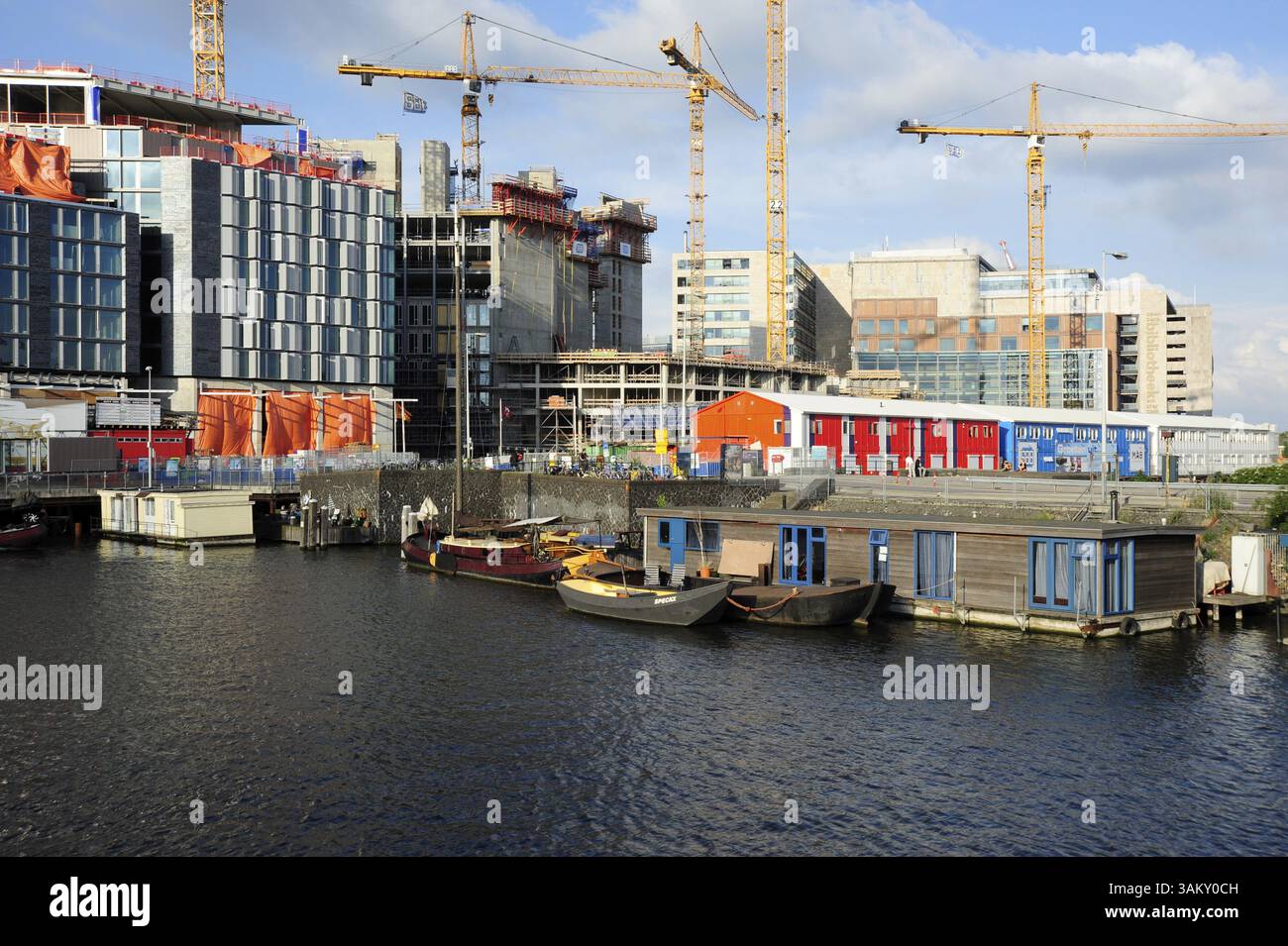 Modern architecture, construction site at Oosterdok quay, Amsterdam ...