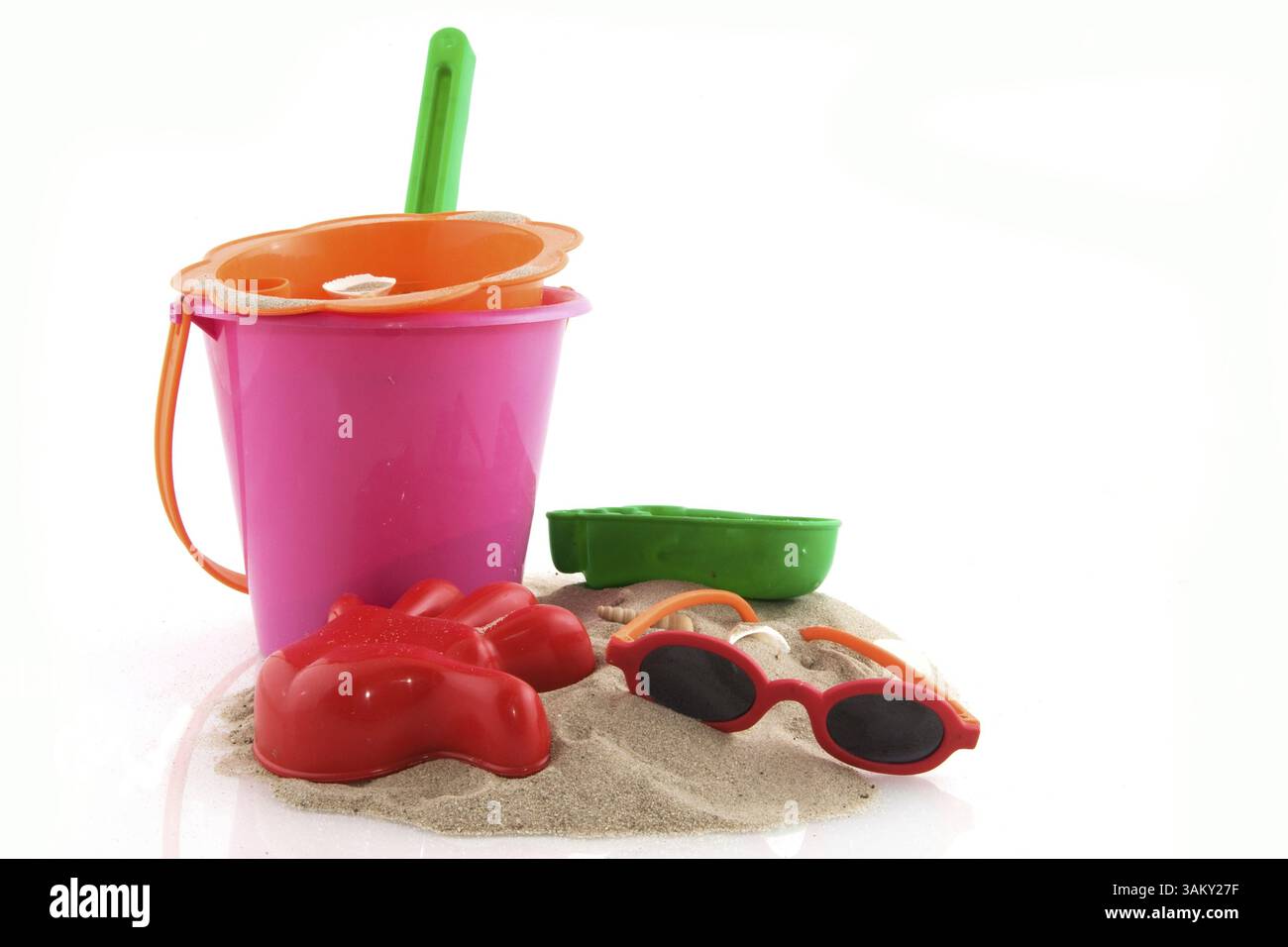 Colorful toys at the beach in the sand Stock Photo - Alamy