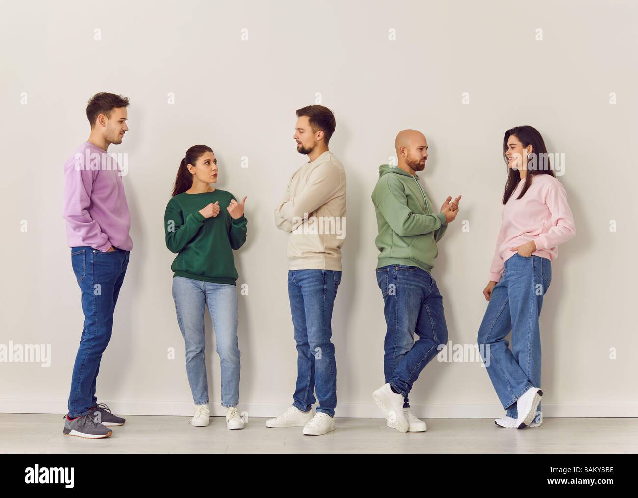Group Of Colleagues Engaged In Office Meeting Stock Photo - Alamy