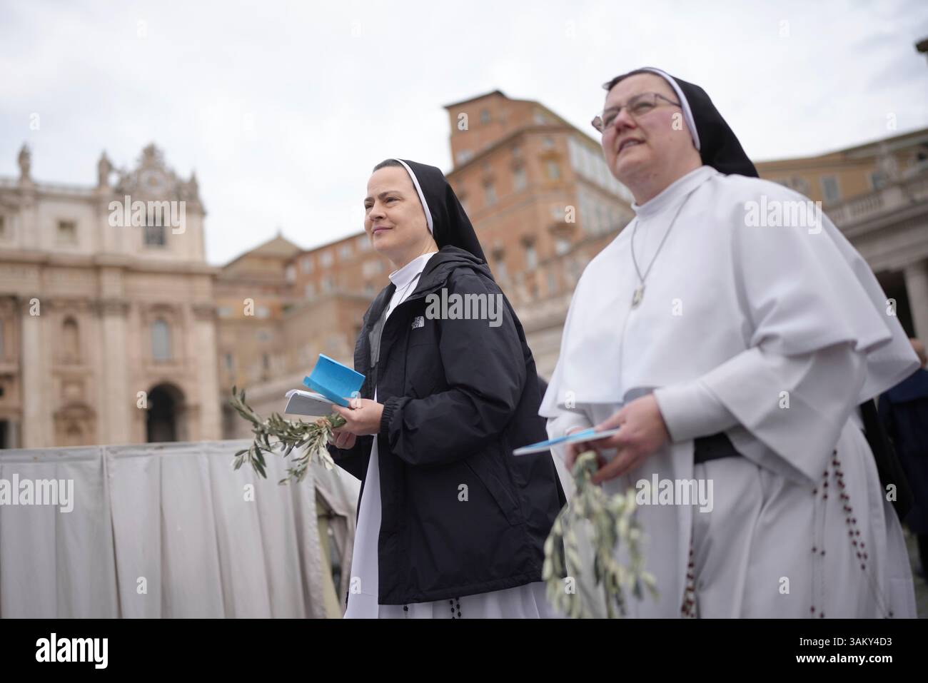 Nuns arrive for the mass on Palm Sunday in St. Peter's Square at The ...