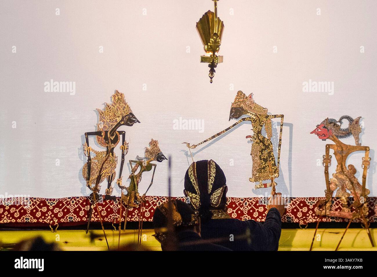 Jakarta, Indonesia. 9th Jan, 2025. A puppeteer performs Wayang Kulit at ...