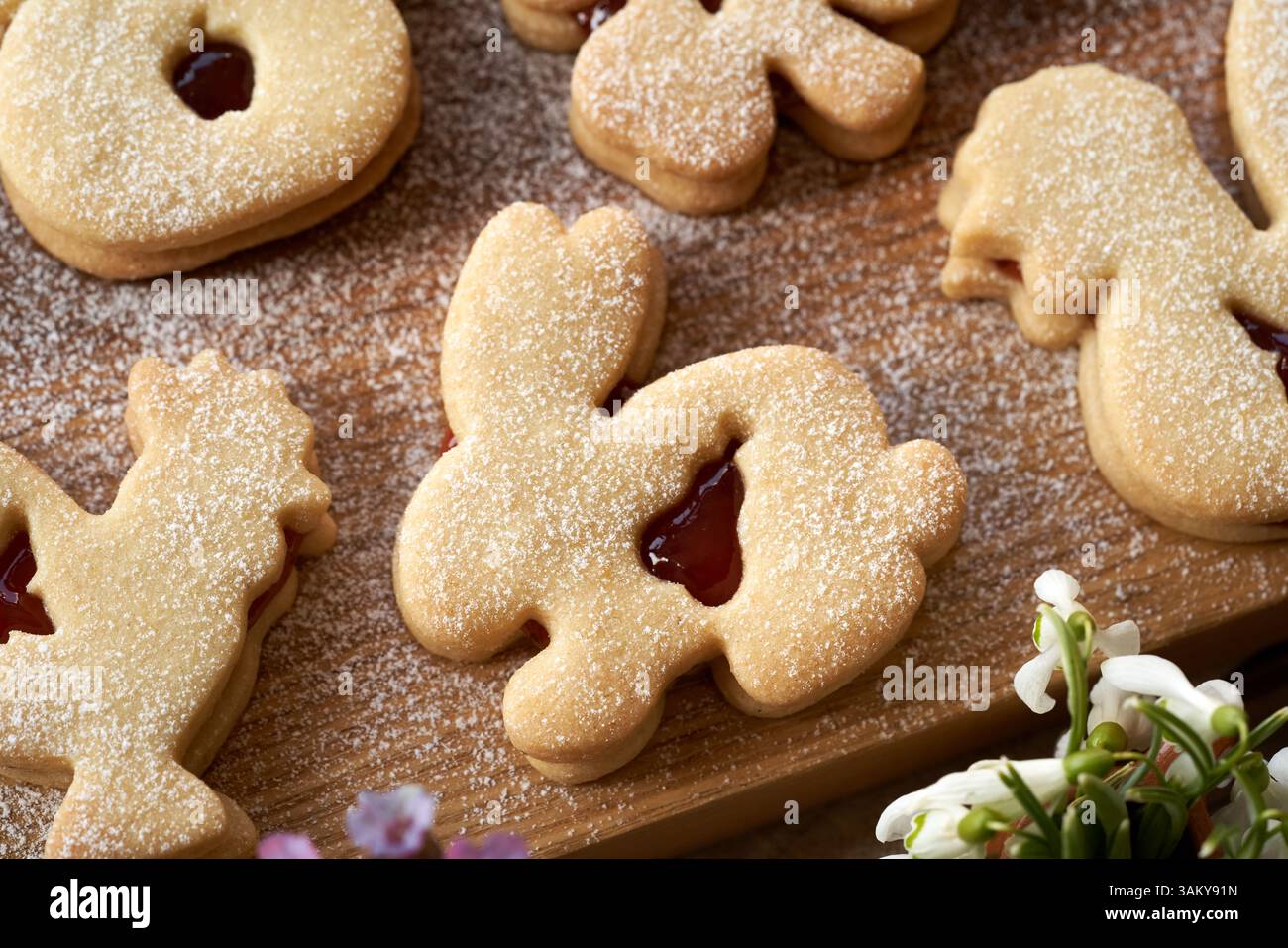 Homemade Linzer cookies in the shape of Easter animals, with spring ...