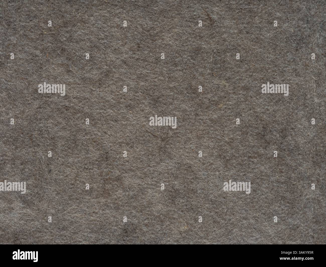 The intricate weave of this heather gray felt texture speaks of quiet ...