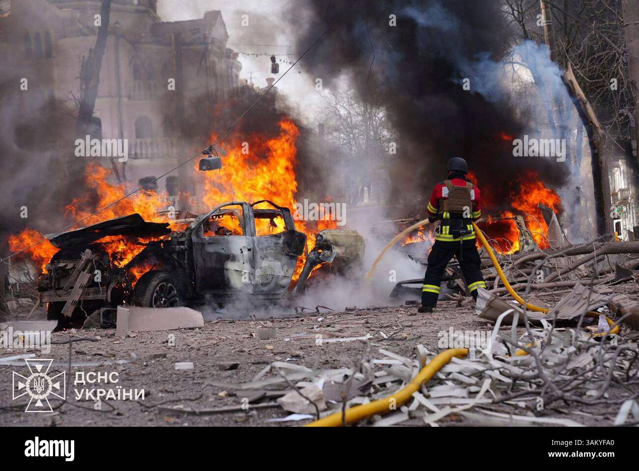 In this photo provided by the Ukrainian Emergency Service, firefighters ...
