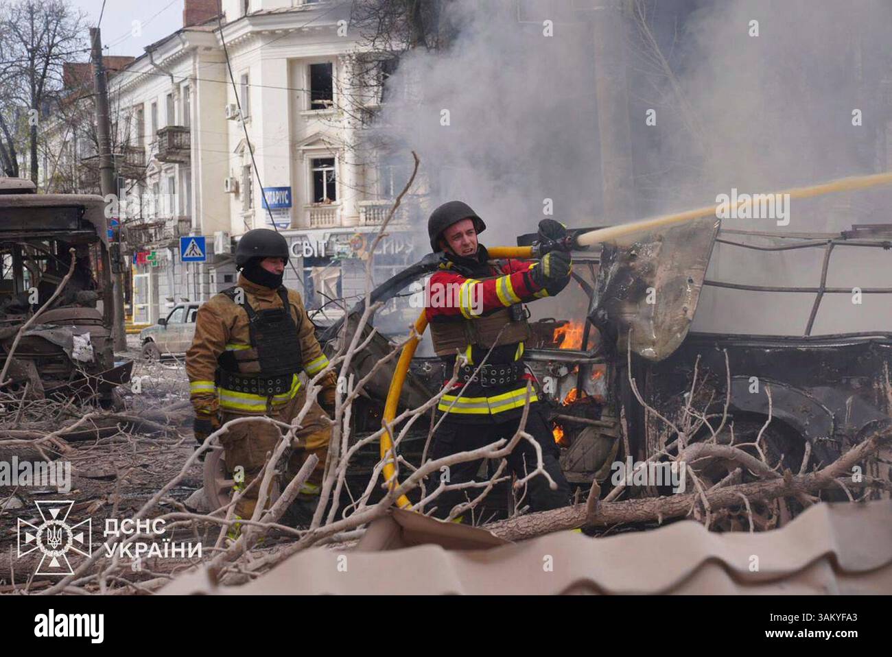In this photo provided by the Ukrainian Emergency Service, firefighters ...