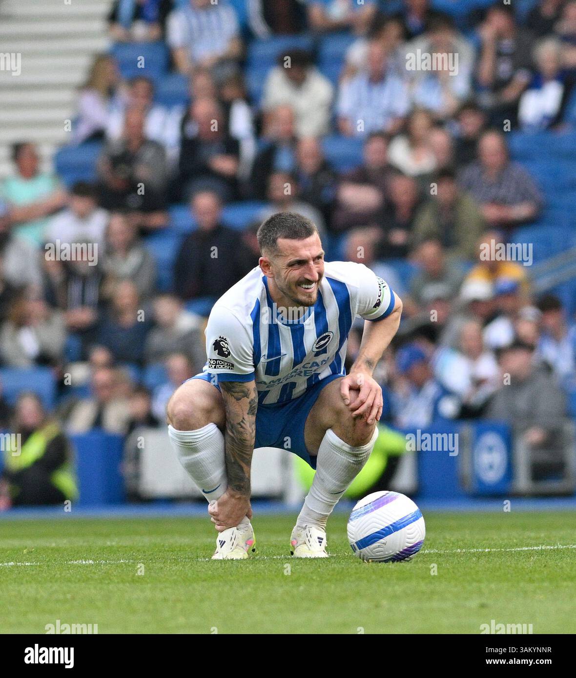 Lewis Dunk of Brighton after taking a knock during the Premier League ...