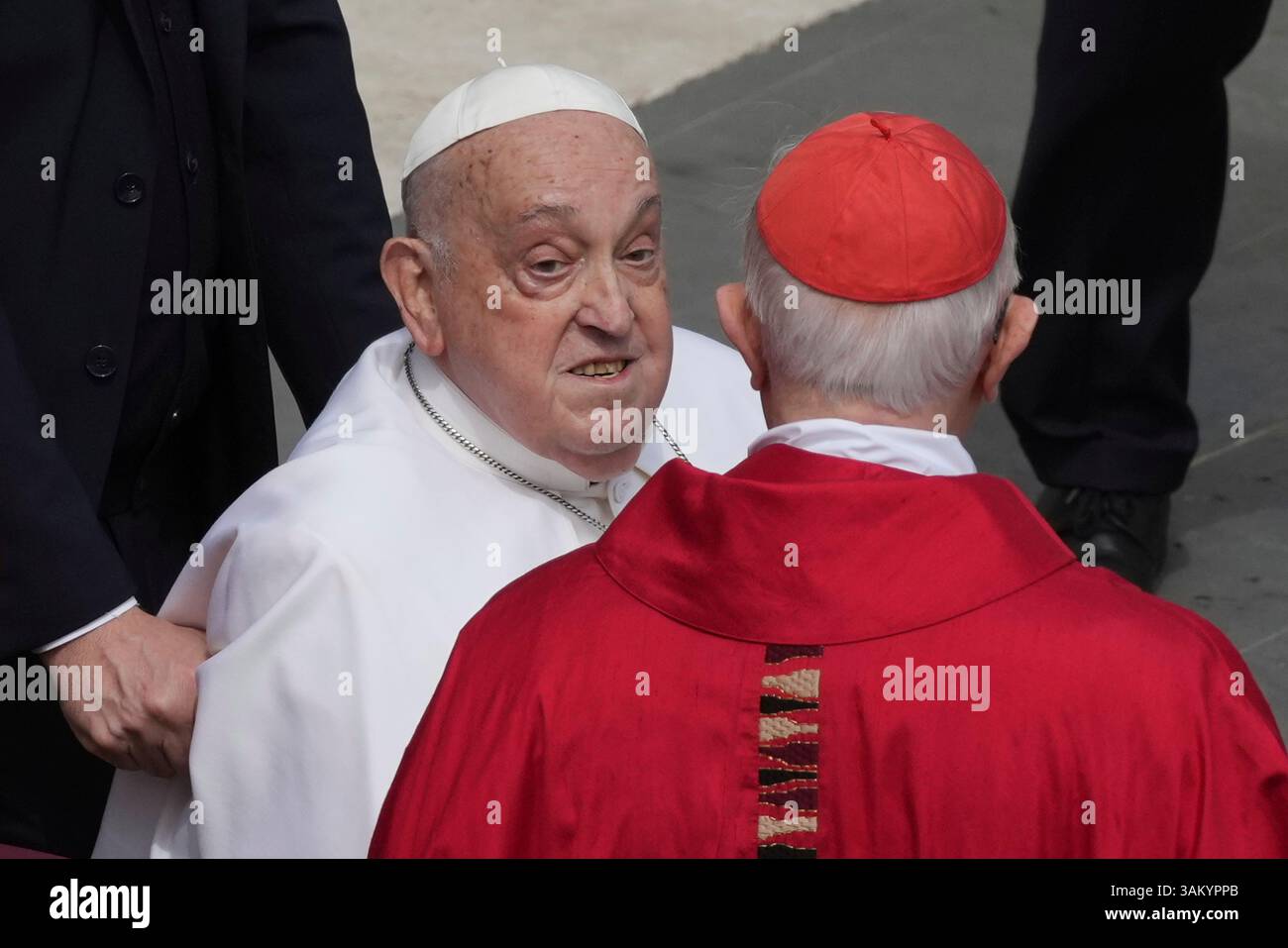 Pope Francis arrives at the end of the mass on Palm Sunday in St. Peter ...