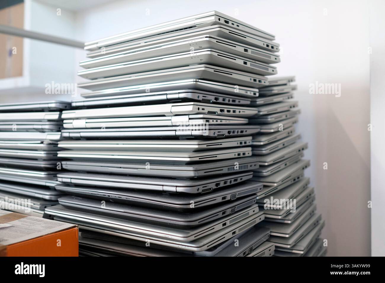 Electronic waste - stack of laptops to be discarded Stock Photo - Alamy
