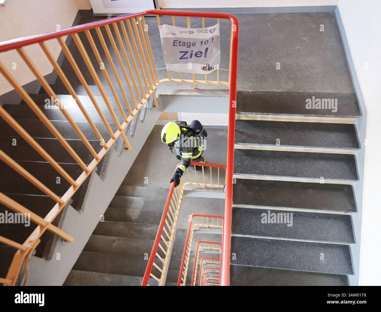 13 April 2025, Saxony, Zwickau: A firefighter with breathing masks and ...