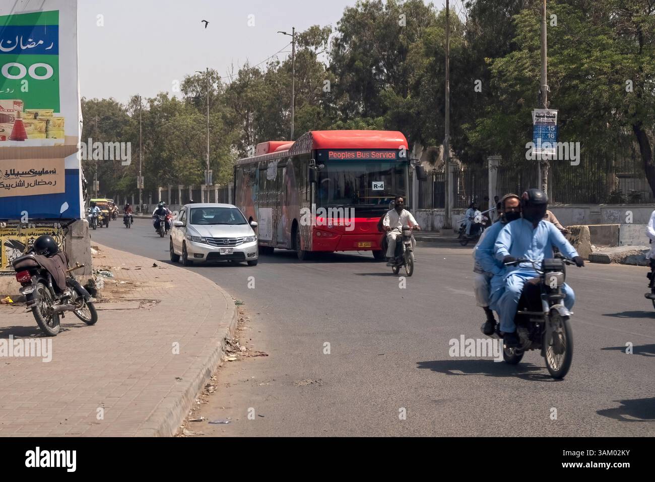 Red line bus service in Karachi. Public transport on Karachi roads ...