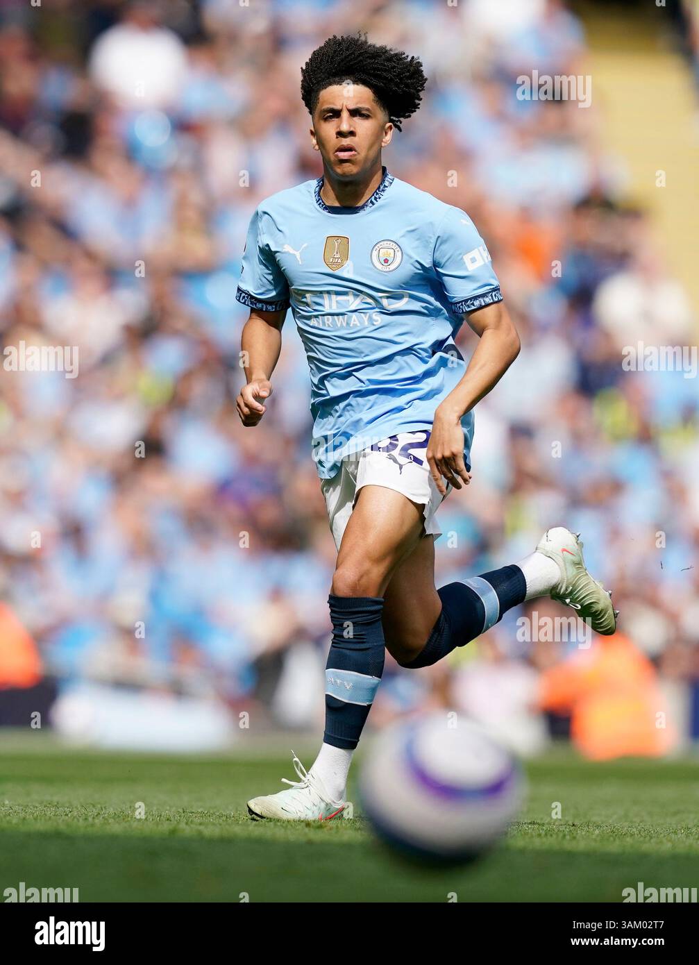 Manchester, UK. 12th Apr, 2025. Rico Lewis of Manchester City during ...