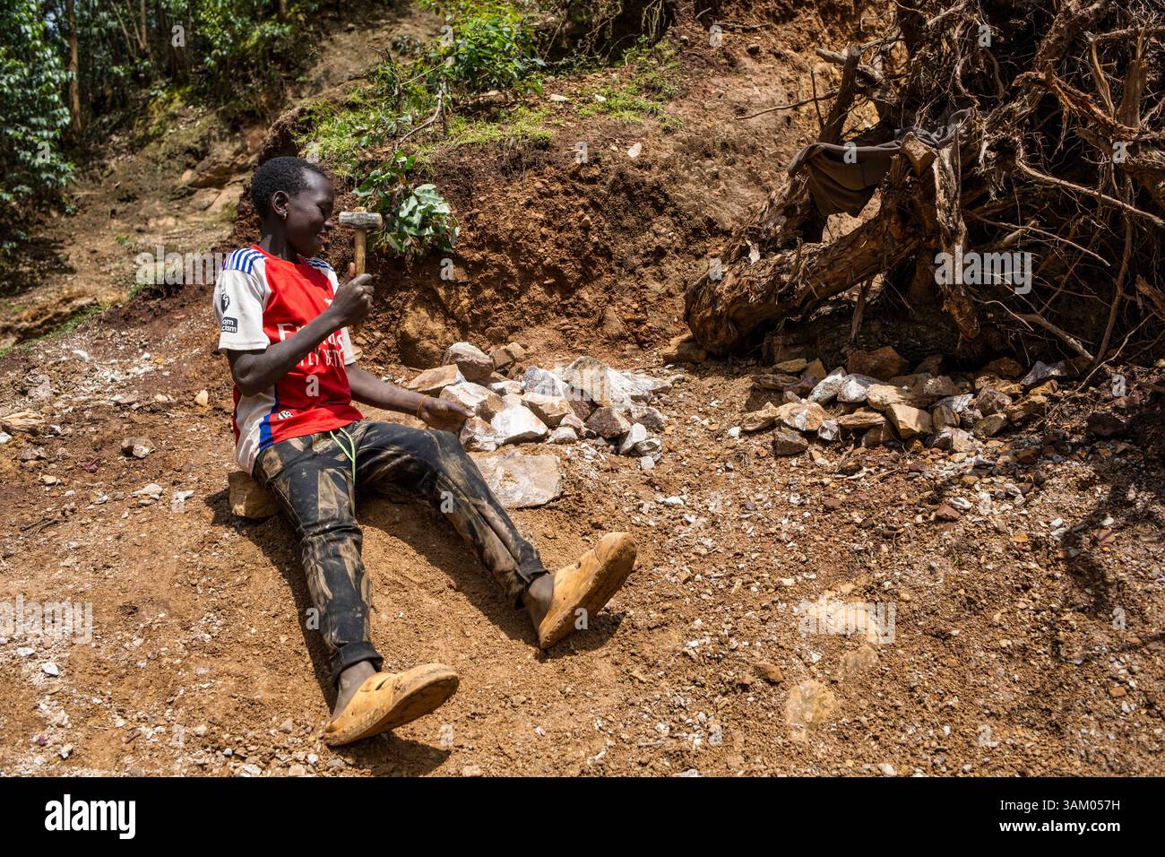 Stone breakers in Uganda, Africa Stock Photo - Alamy