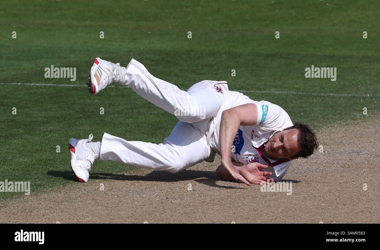 Hove, UK. 13th Apr, 2025. Somerset's Josh Davey looses his footing as ...