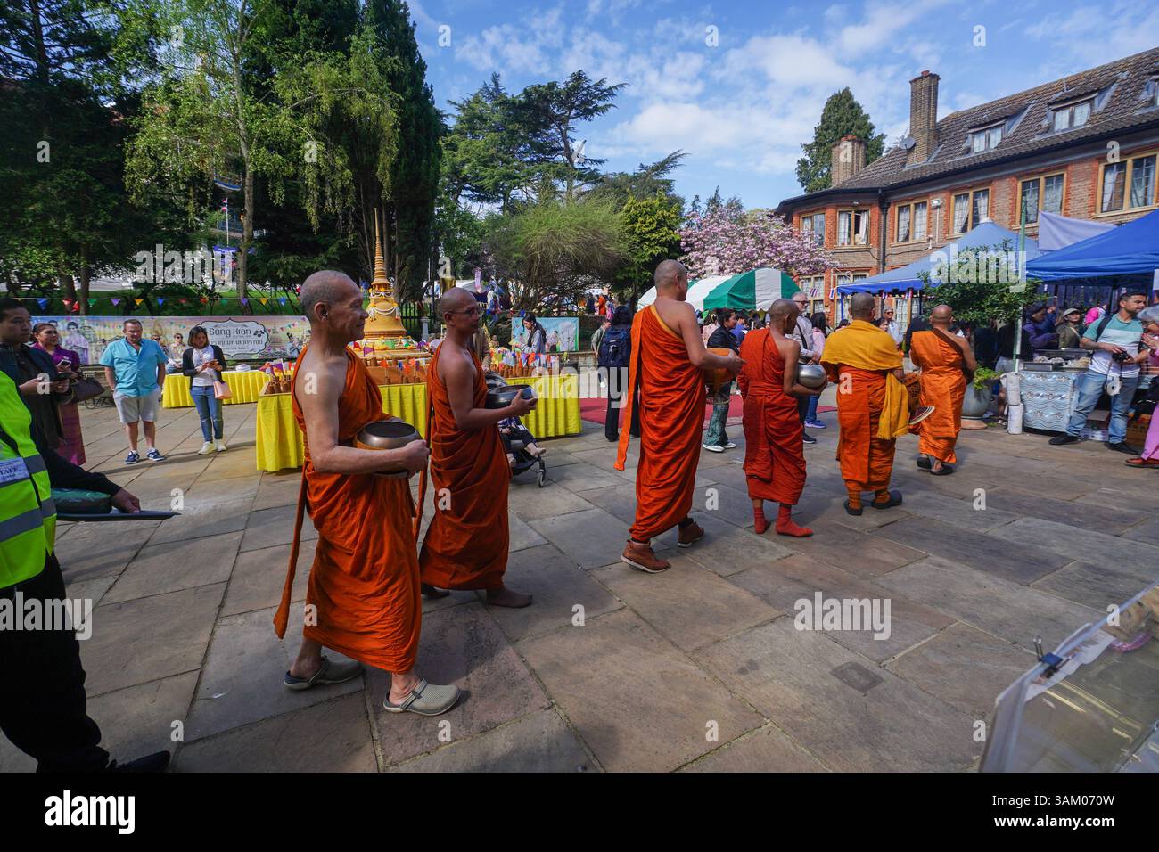 London UK 13 April 2025. Buddhist monks give blessings at the Thai New ...