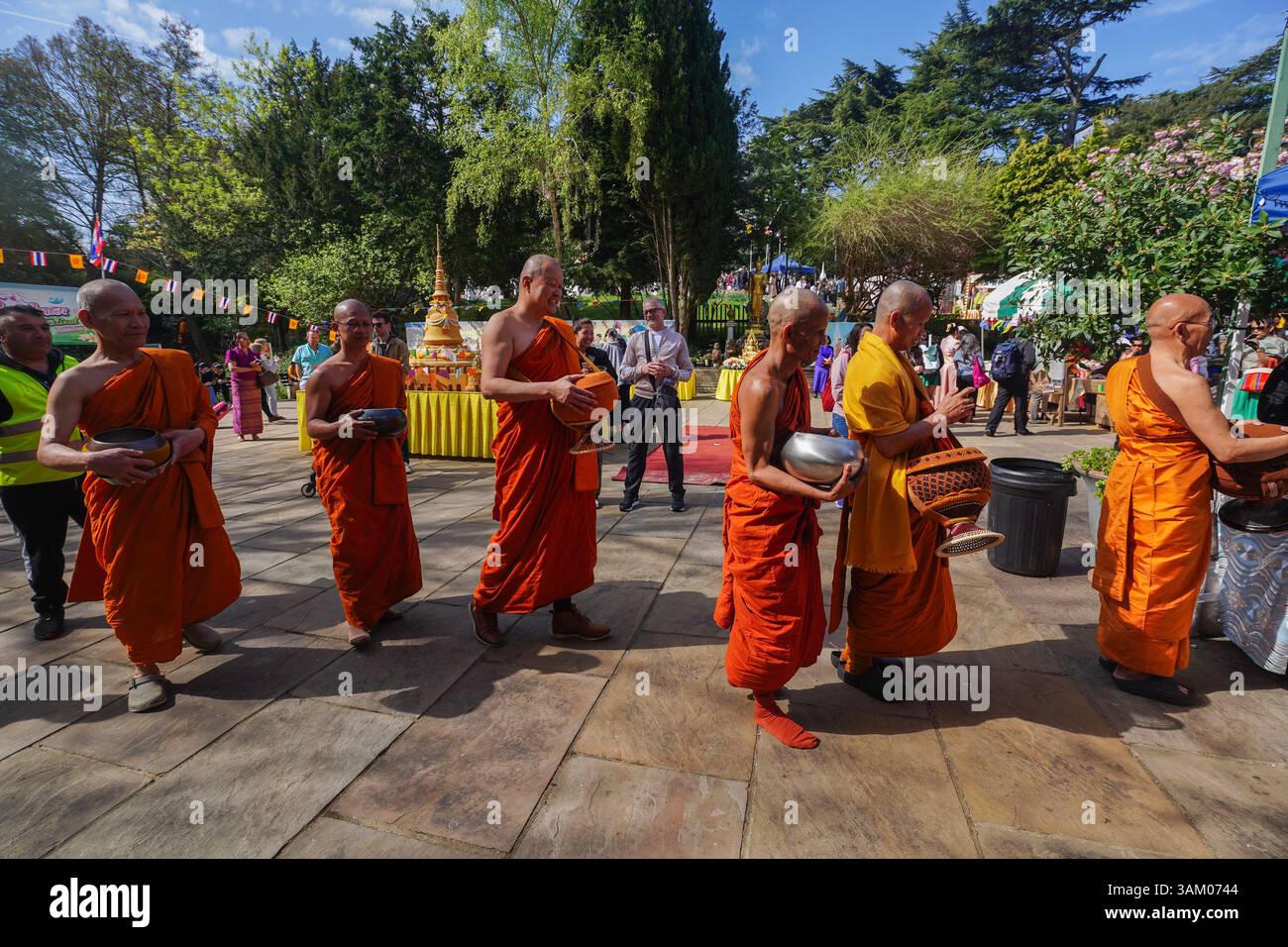London UK 13 April 2025. Buddhist monks give blessings at the Thai New ...