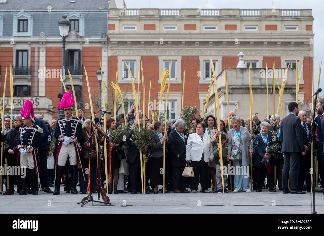 Several people during the blessing of bouquets at the Almudena ...