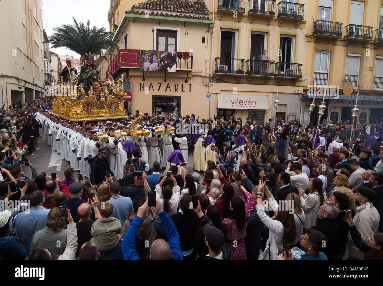 Malaga, Spain. 13th Apr, 2025. A general view show penitents from ...