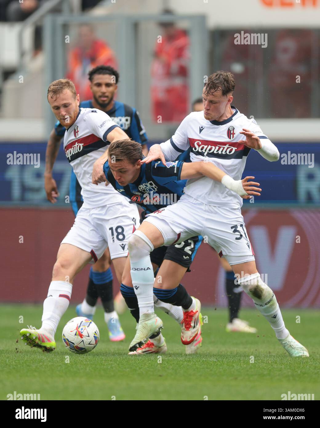 Bergamo, Italy. 13th Apr, 2025. Mateo Retegui of Atalanta clashes with ...